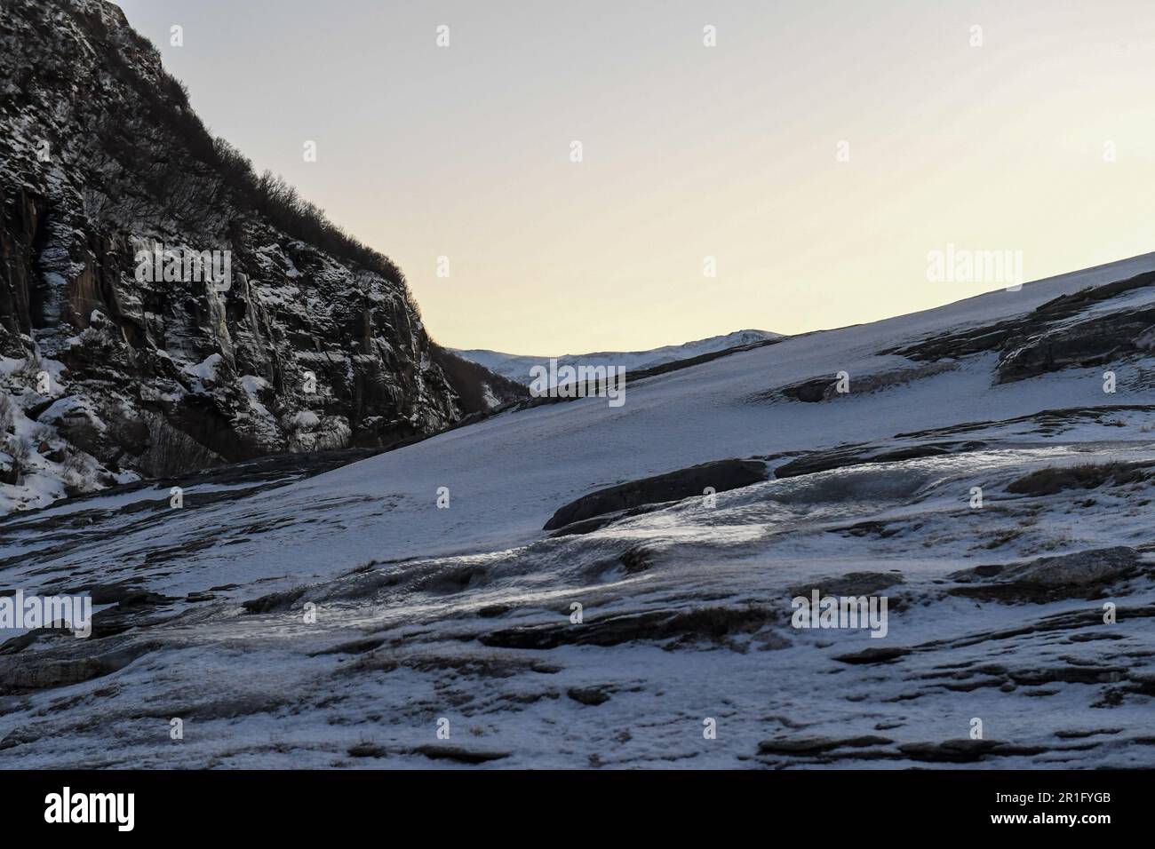 Landscape shot highlighting the rugged mountains and snow-covered ...