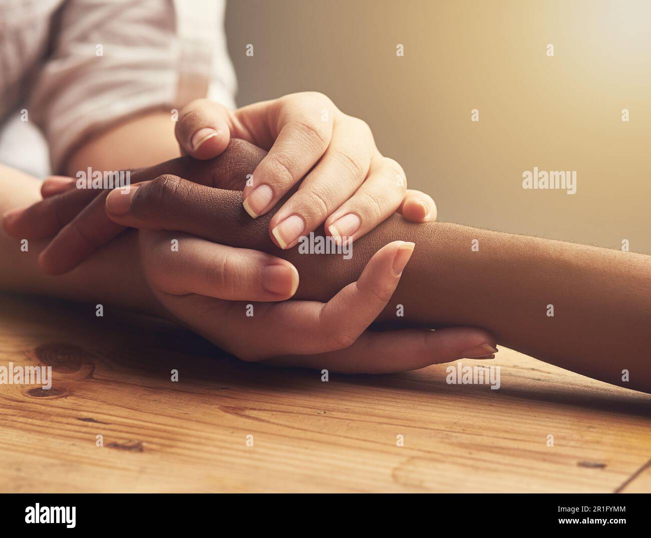 Empathy, trust and support with people holding hands as friends in ...