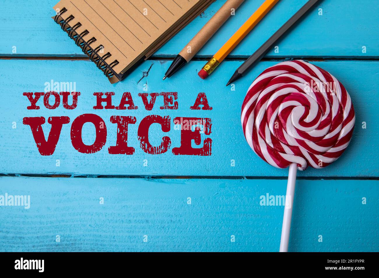 You Have a Voice. Text on blue painted wood texture background Stock ...