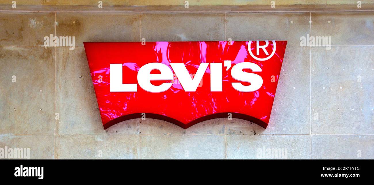 Levi Strauss logo sign above the shop entrance Stock Photo - Alamy