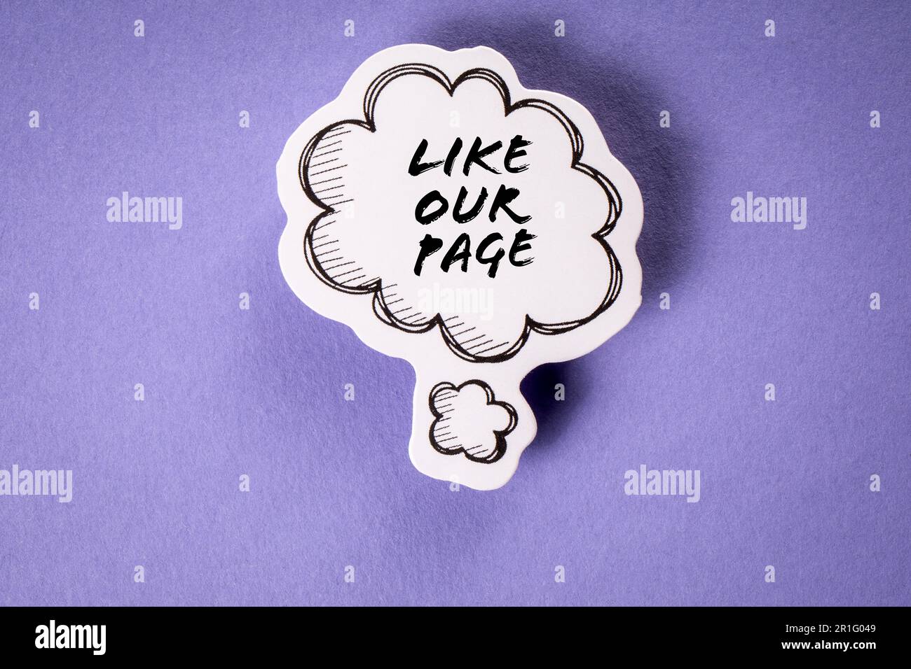 Like Our Page. Speech bubble with text on purple background Stock Photo ...
