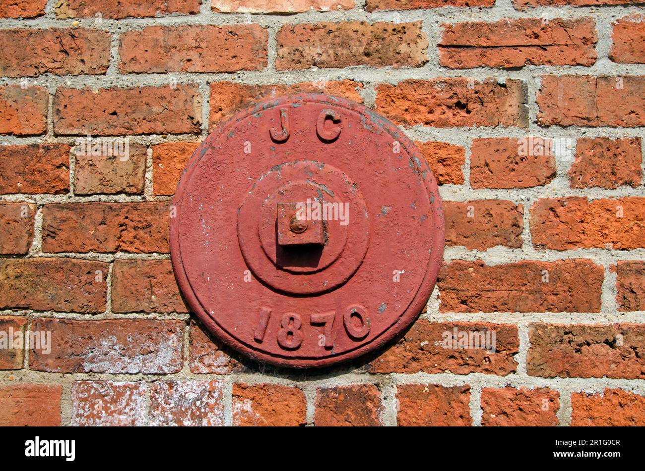 Old brickwork with metal support. Metal brace support for old building Stock Photo - Alamy