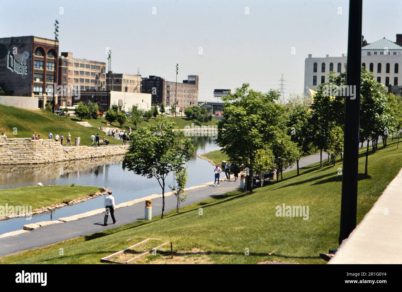 People enjoying the river walk in downtown Omaha Nebraska ca. 1987 ...