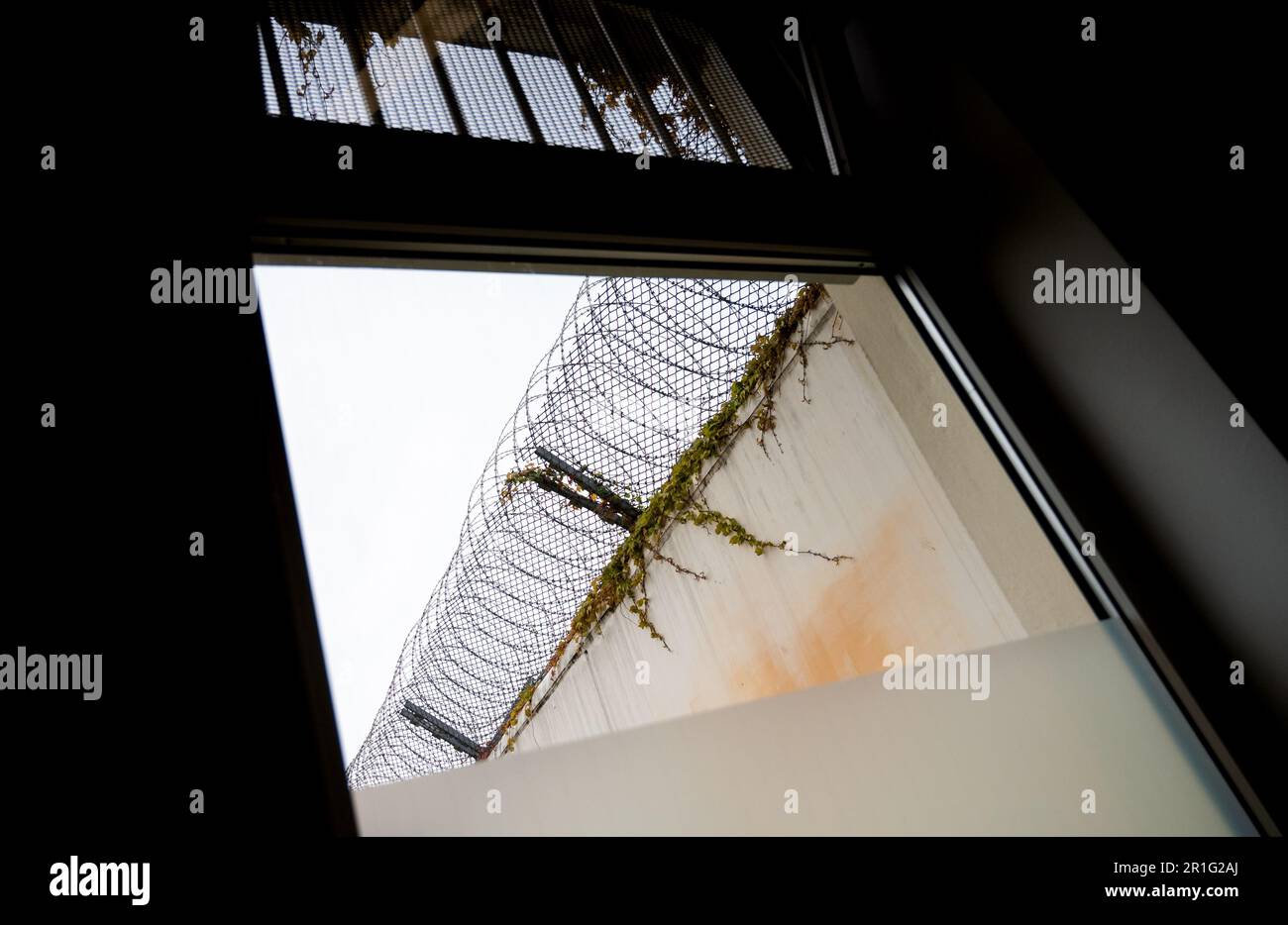 Hamburg, Germany. 10th May, 2023. Barbed wire and barred windows secure ...
