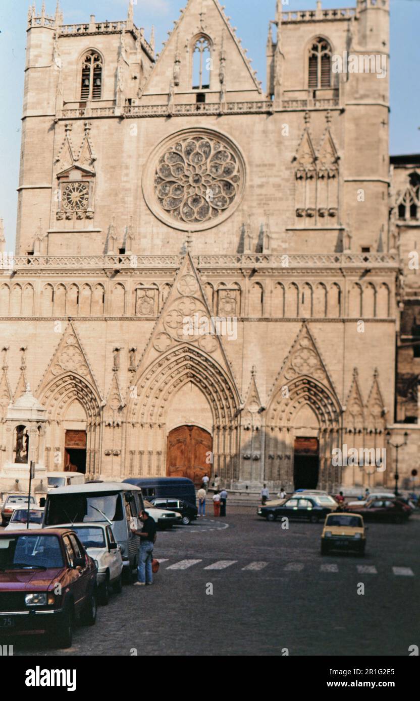 Cars parked in front of Cathedral Saint John the Baptist, 12th-15th ...