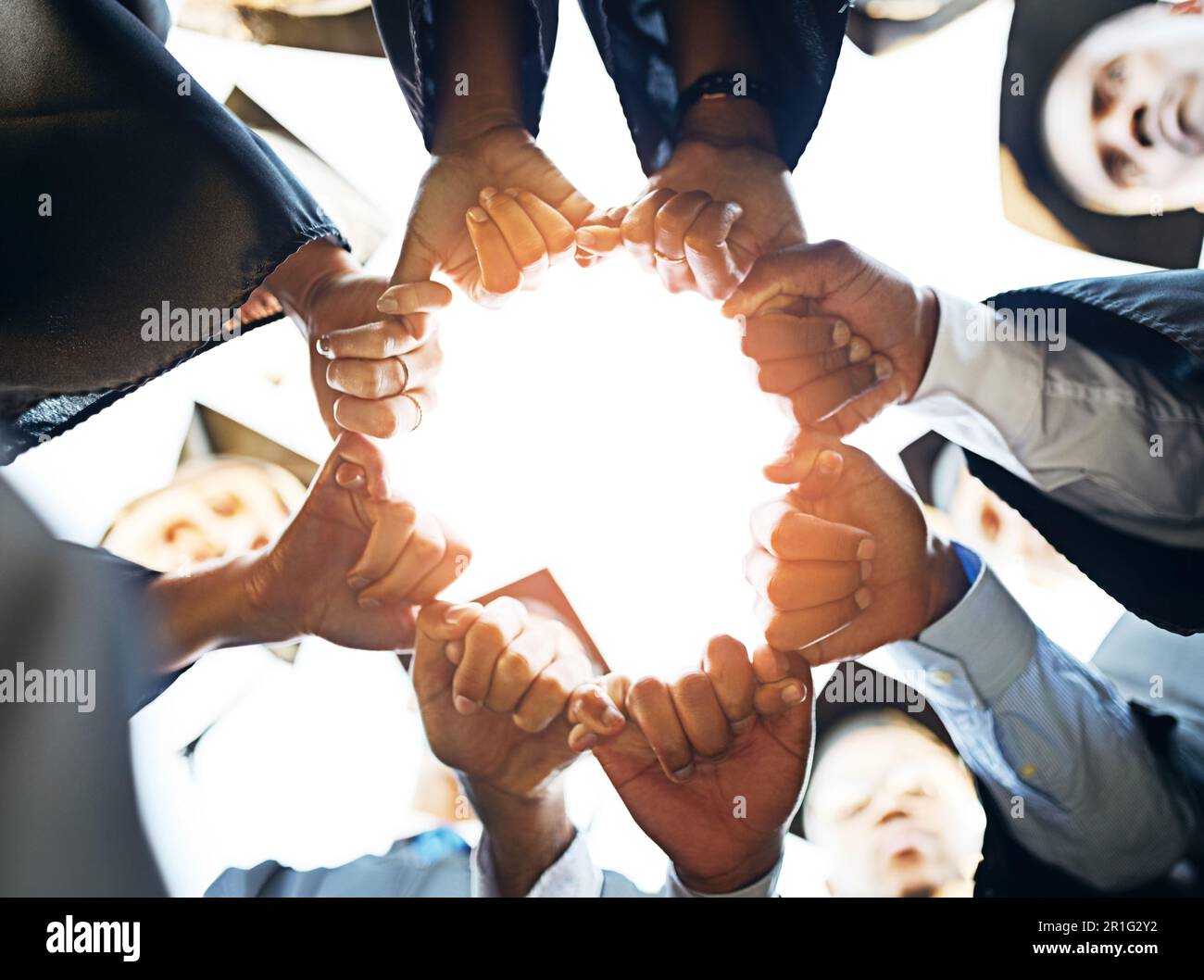 Together we can build a brighter future. Closeup shot of a group of ...