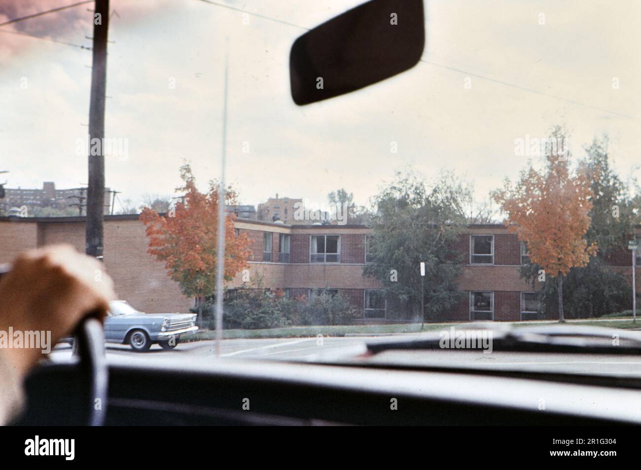 View of an oncoming car at a street corner, image taken by car ...