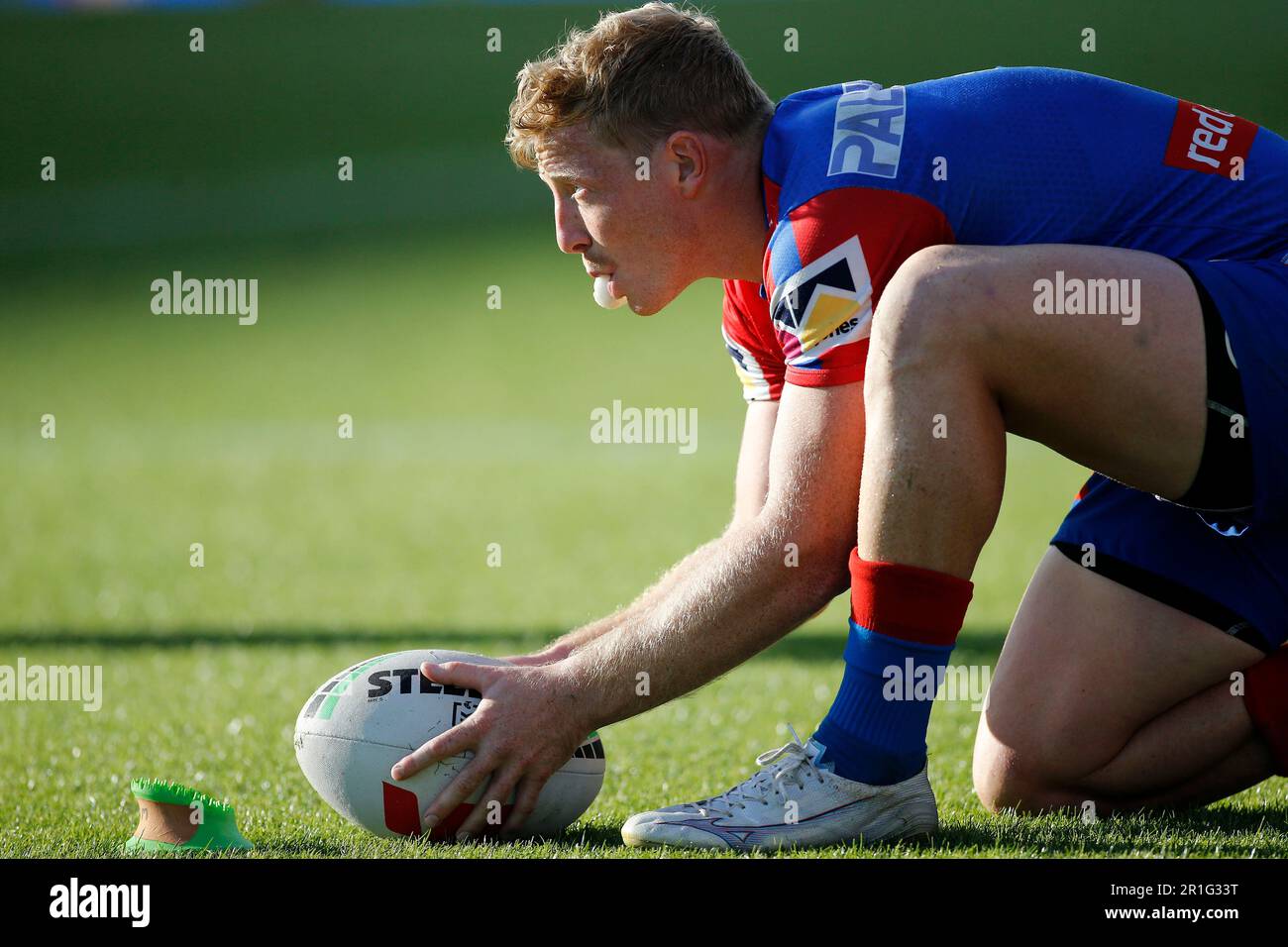 Lachlan Miller of the Knights lines up a conversion during the NRL ...