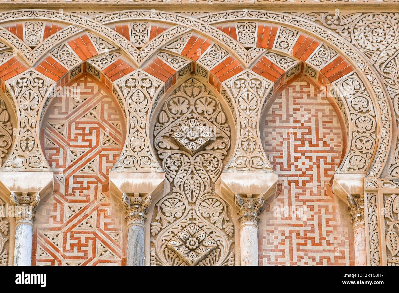 An image of an ornately carved stone wall featuring intricate carvings ...