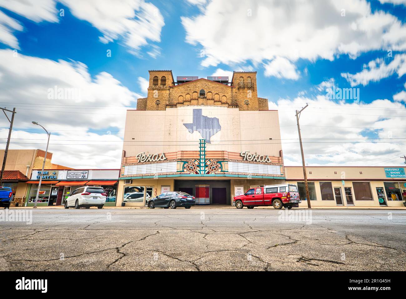 The Texas Theatre in San Angelo, Texas stands out against the clouds ...