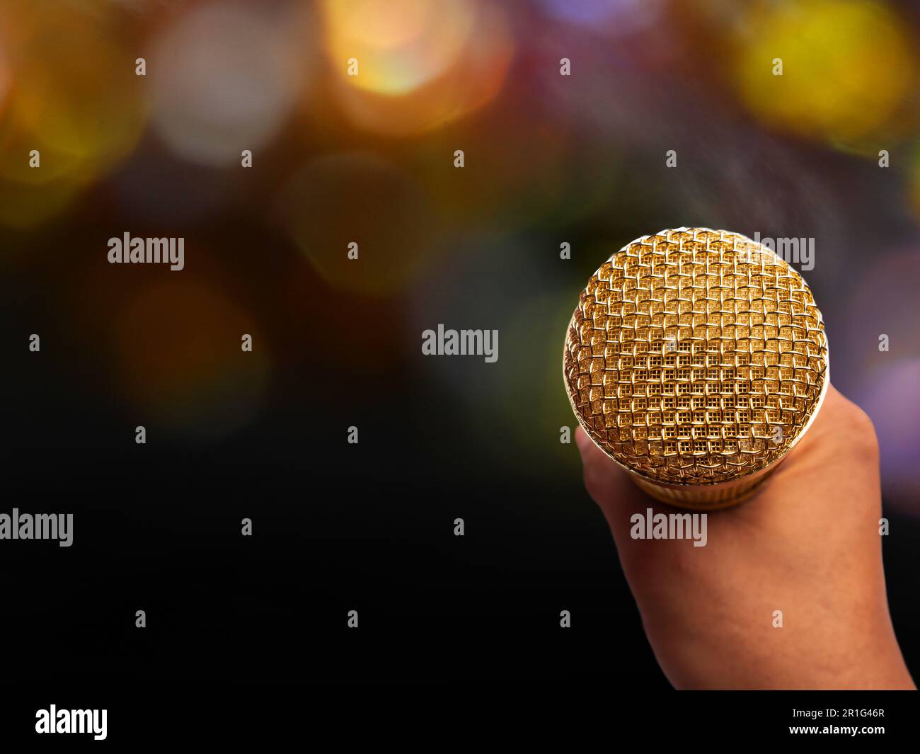 Holding microphone stand hi-res stock photography and images - Alamy