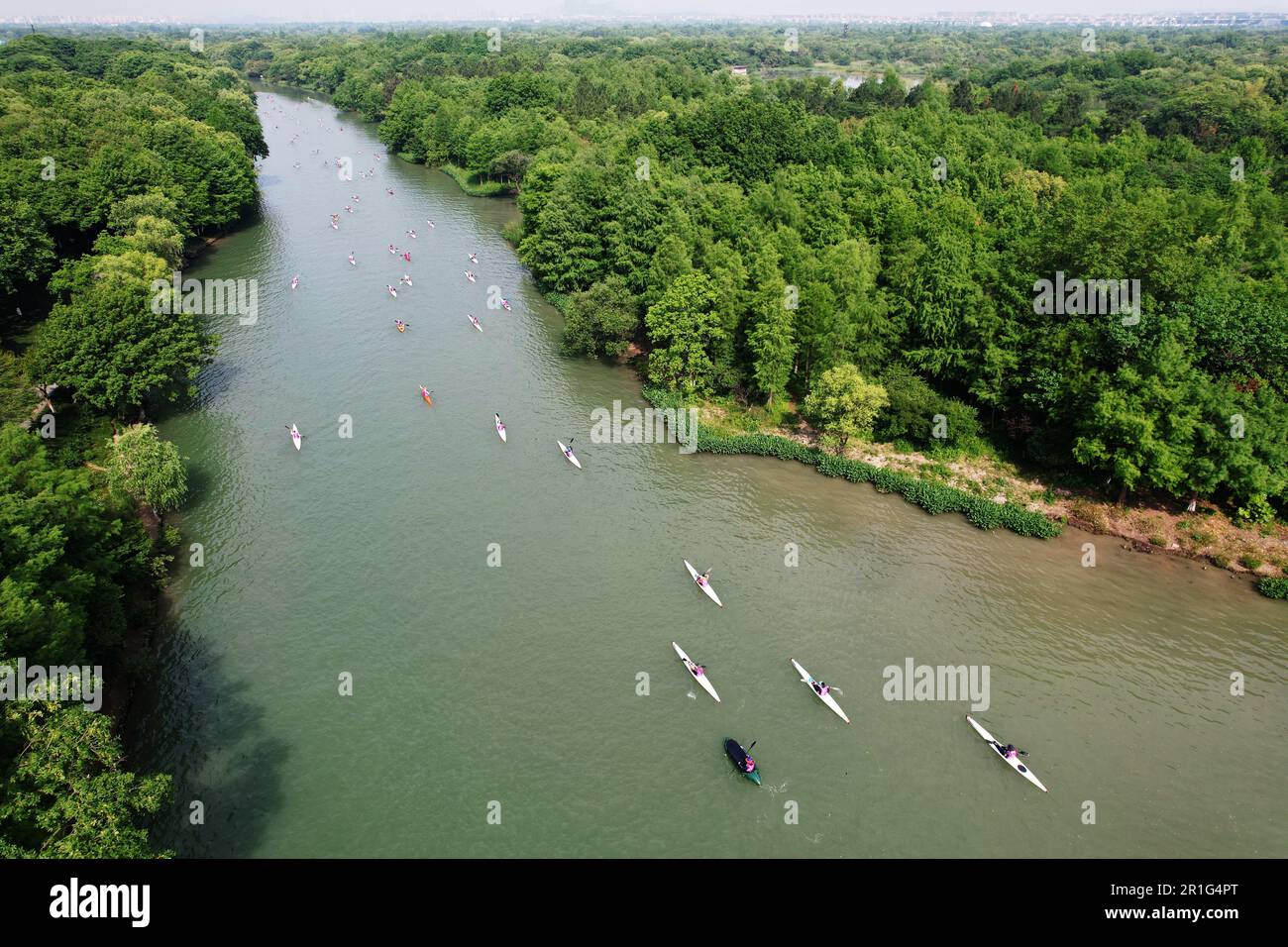 HANGZHOU, CHINA - MAY 14, 2023 - Participants take part in a kayaking ...