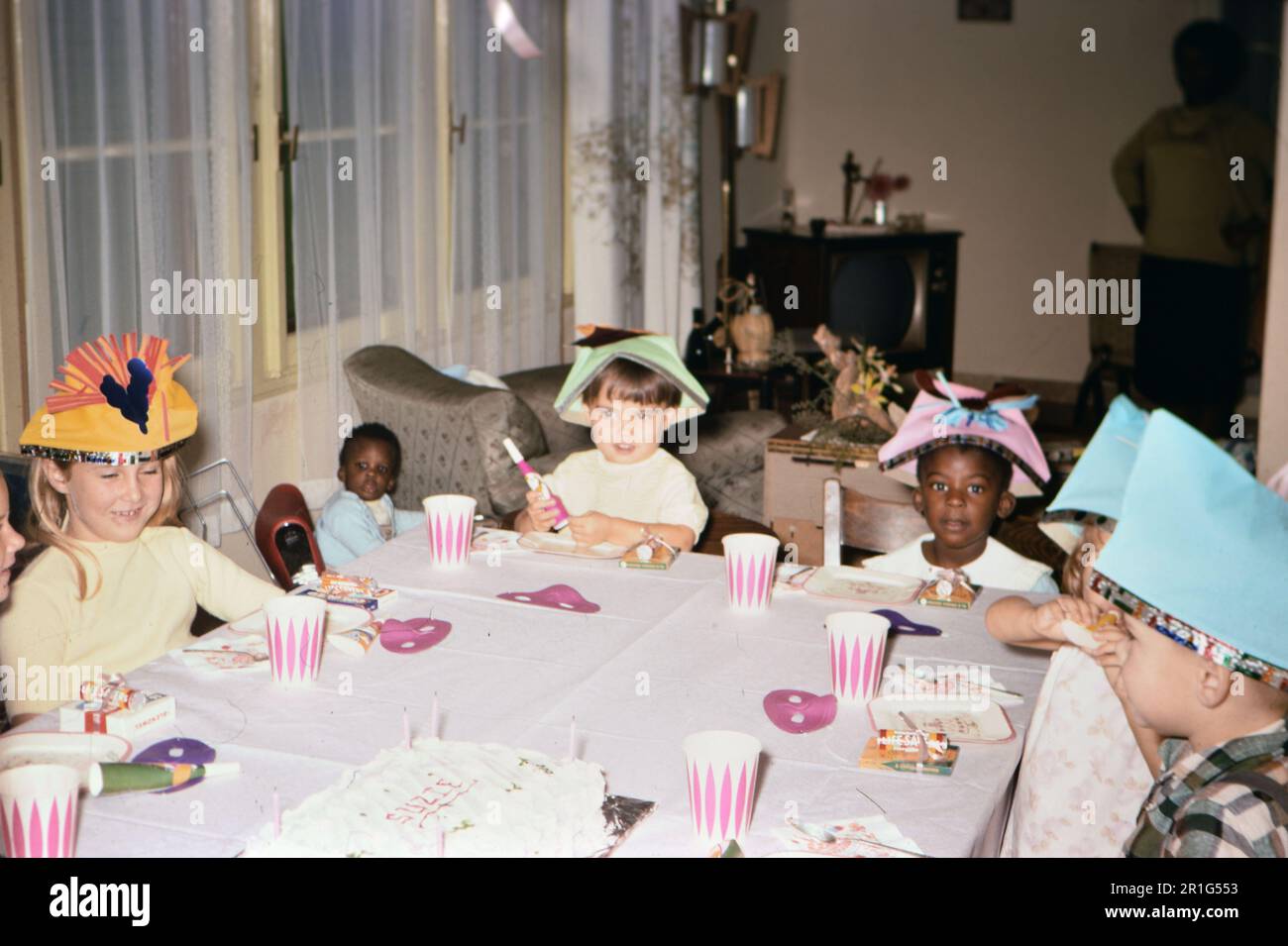 Children having fun and enjoying a birthday party ca. 1968 Stock Photo ...