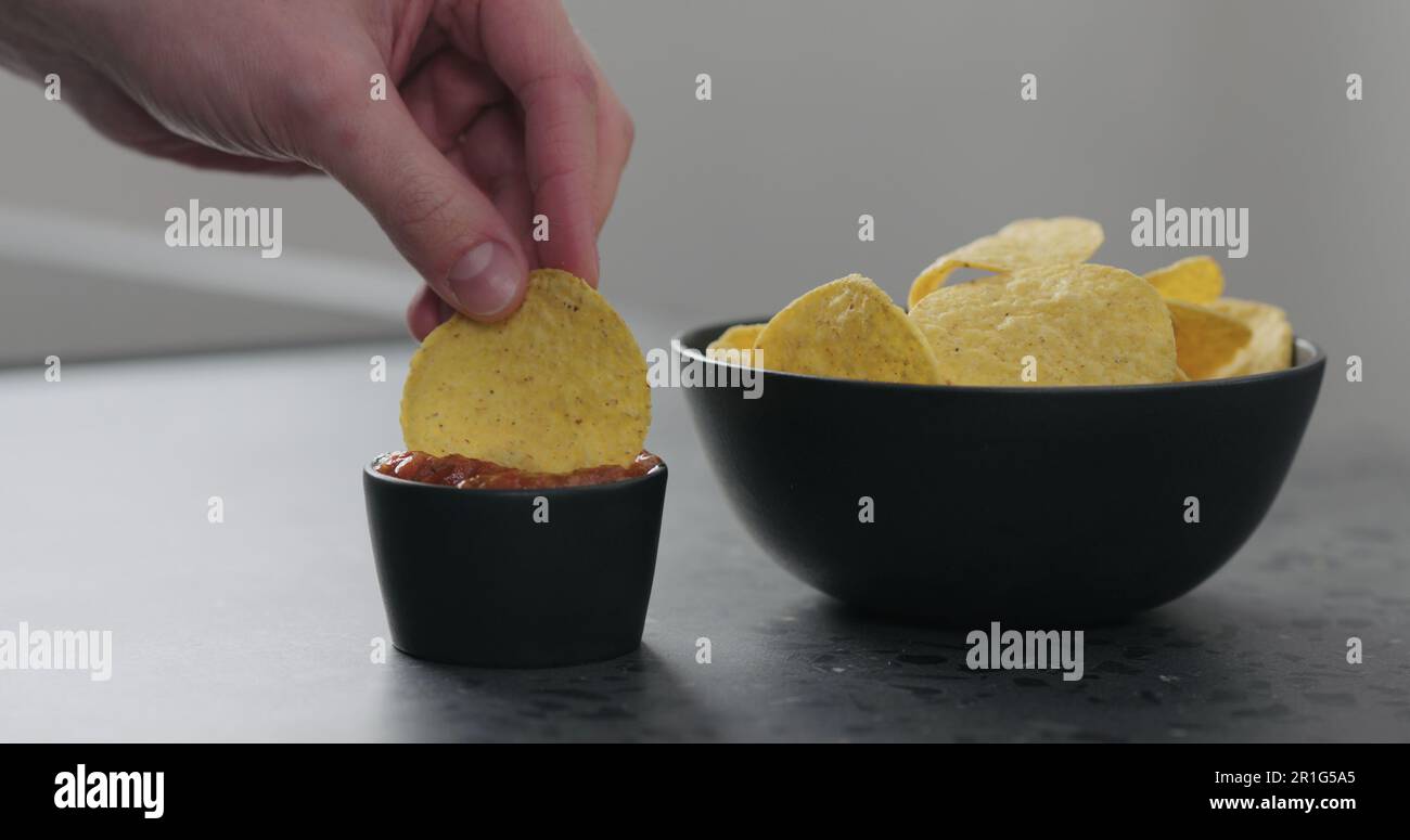 Corn chips mexican hand chips hi-res stock photography and images - Alamy