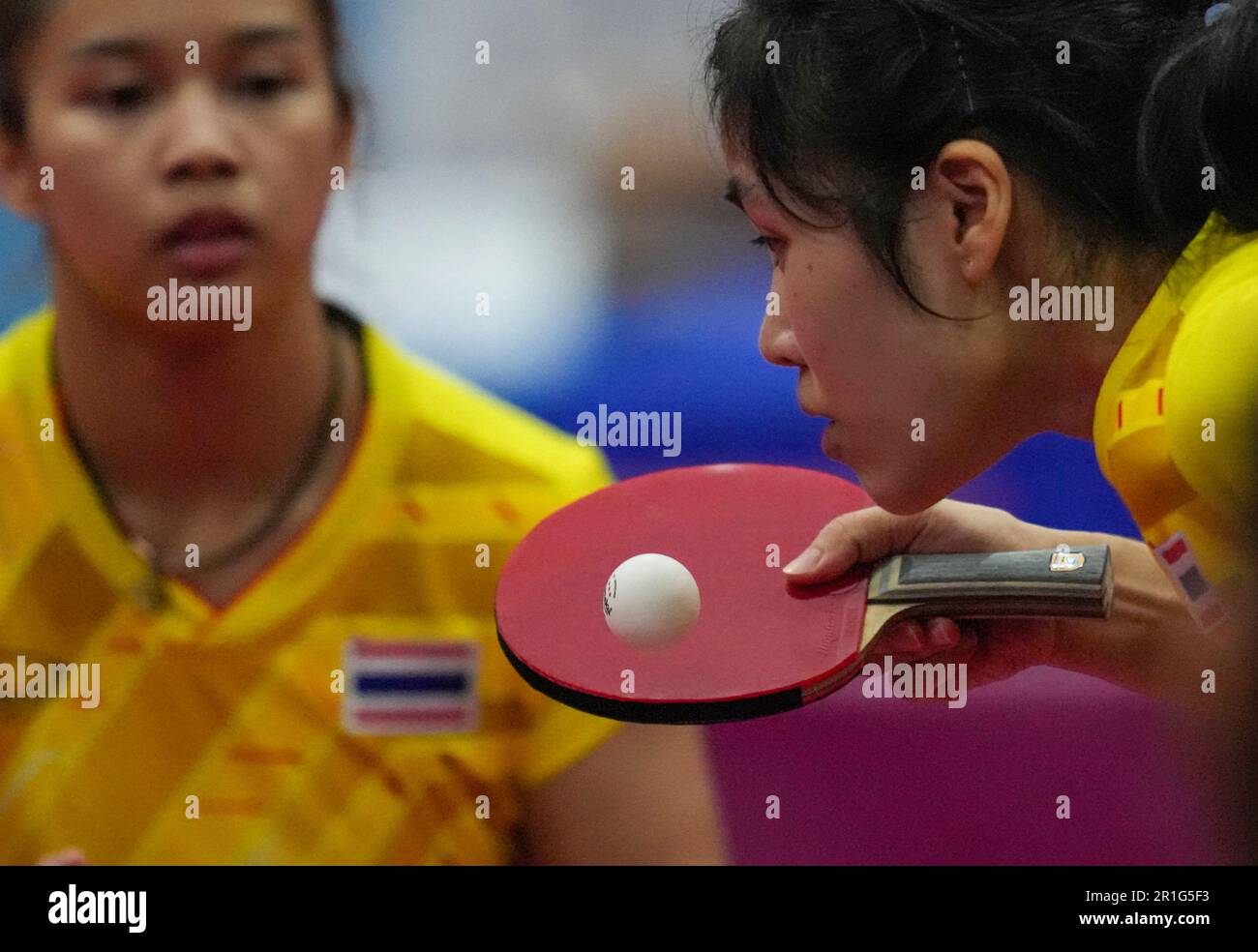 Thailand's Suthasini Sawettabut, right, returns a shot near Orawan ...
