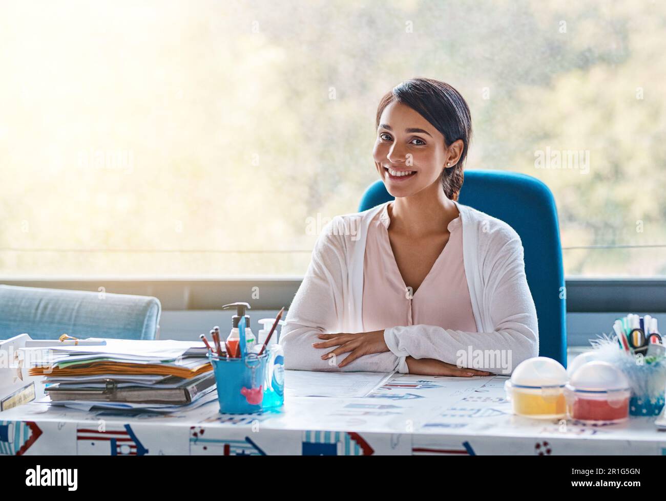 Step into my office. Portrait shot of a focussed young female teacher ...