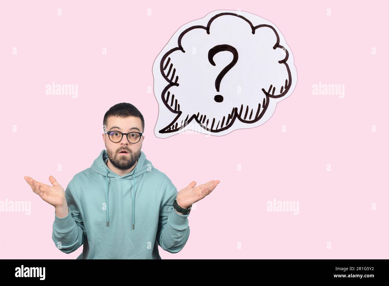 surprised young man looking directly into the camera Stock Photo - Alamy