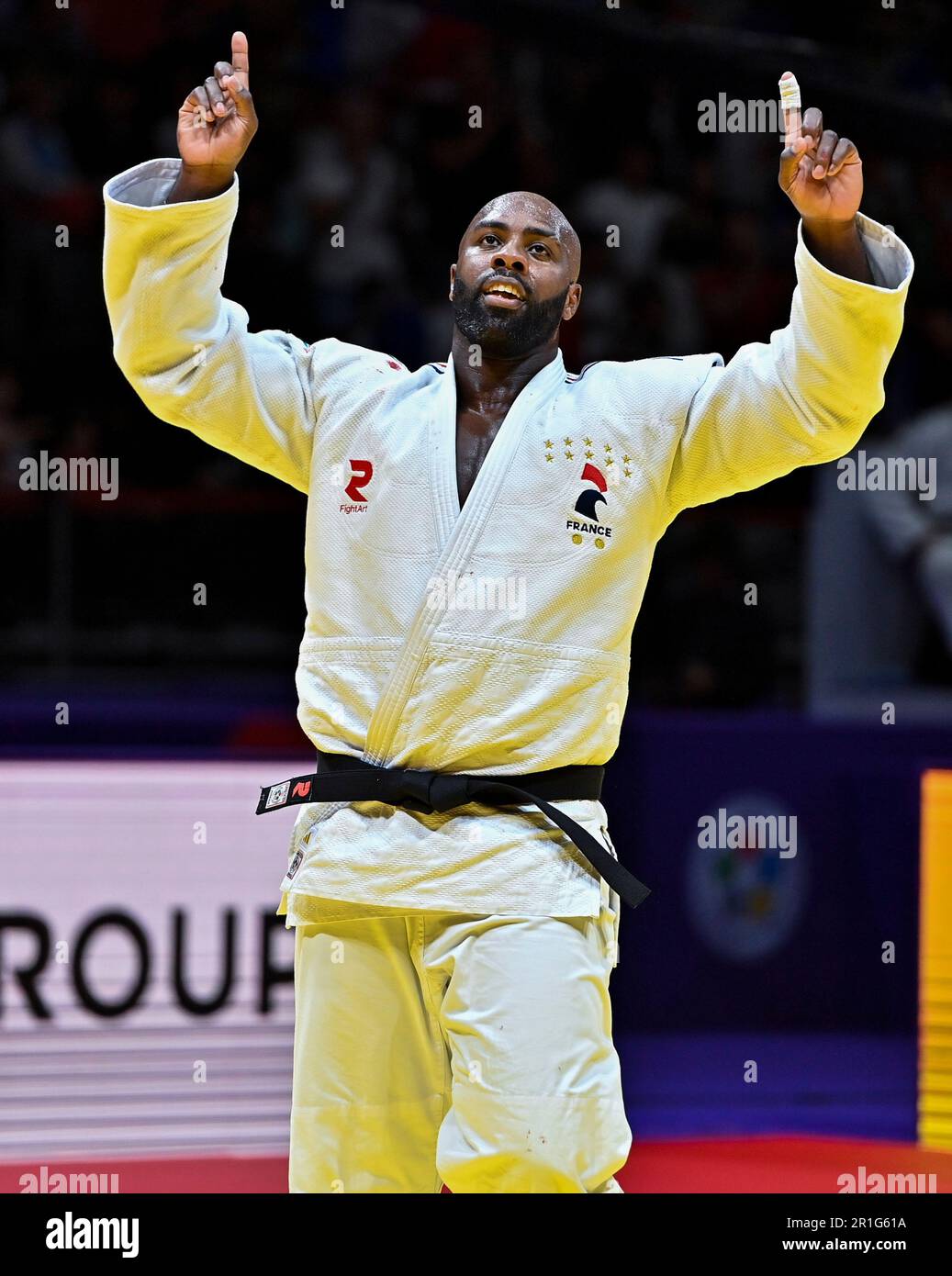 Doha. 13th May, 2023. Teddy Riner of France celebrates after winning ...