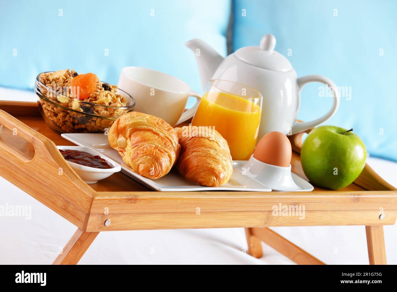 Breakfast on tray in bed in hotel room Stock Photo - Alamy