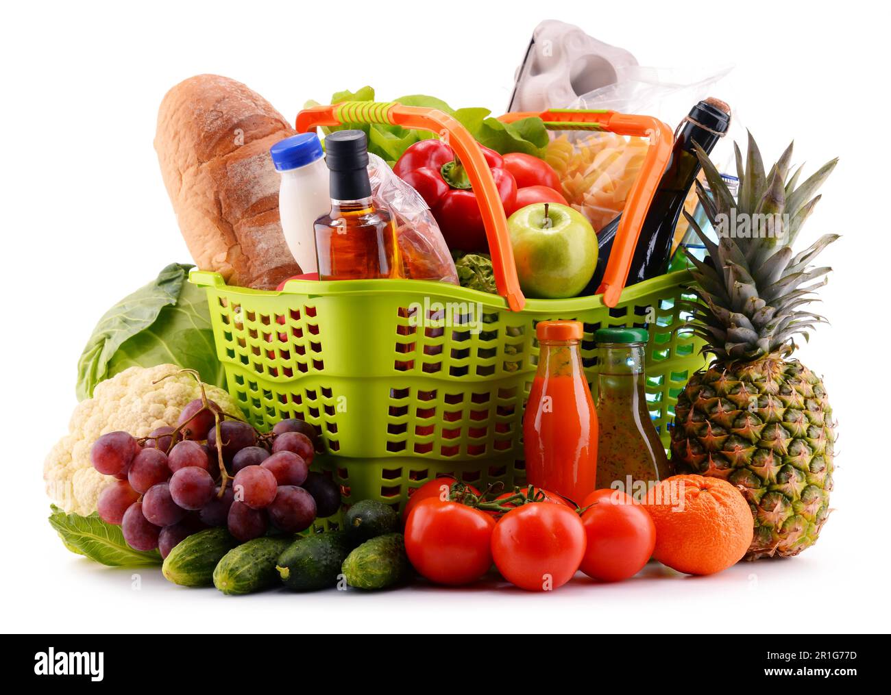 Plastic shopping basket with assorted gorcery products isolated on ...