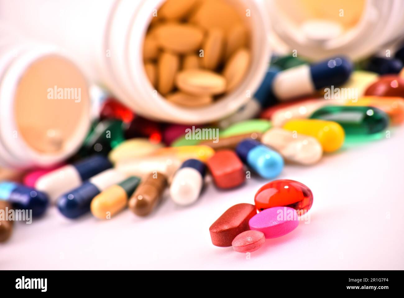 Composition with variety of drug pills and containers Stock Photo - Alamy