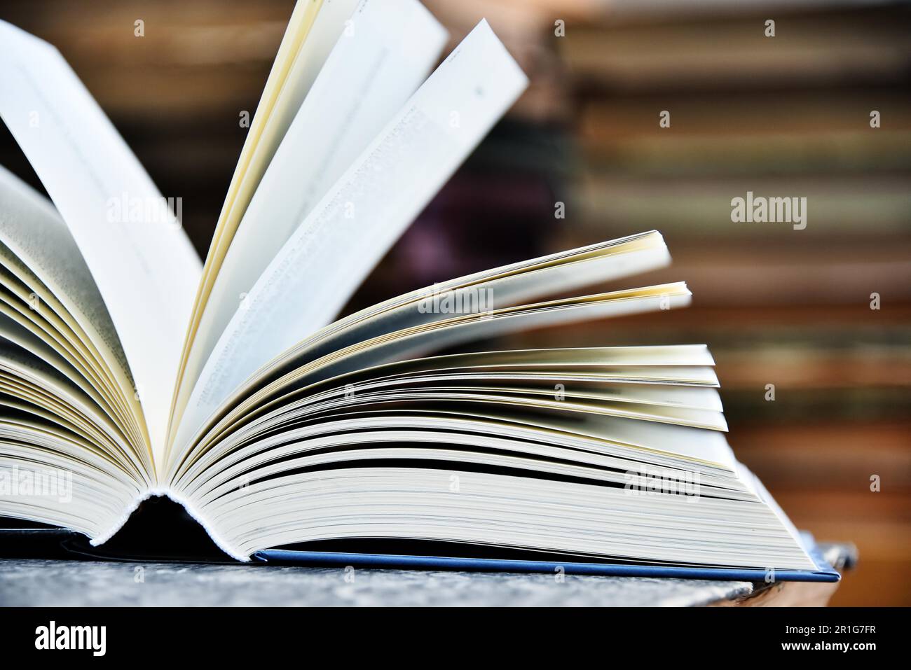 Book lying on the table hi-res stock photography and images - Alamy