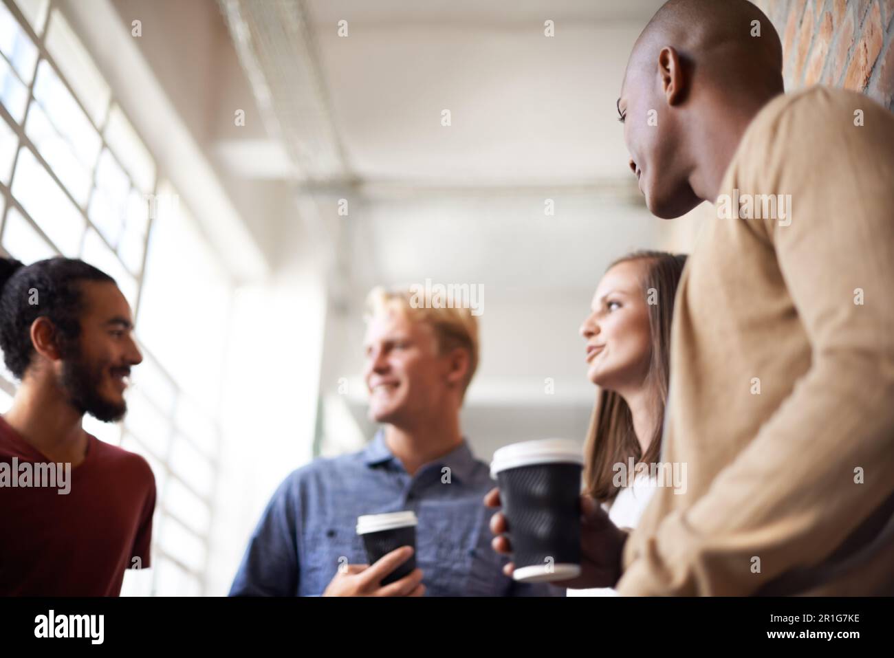 Coffee, talking and friends or students in a college hallway for ...