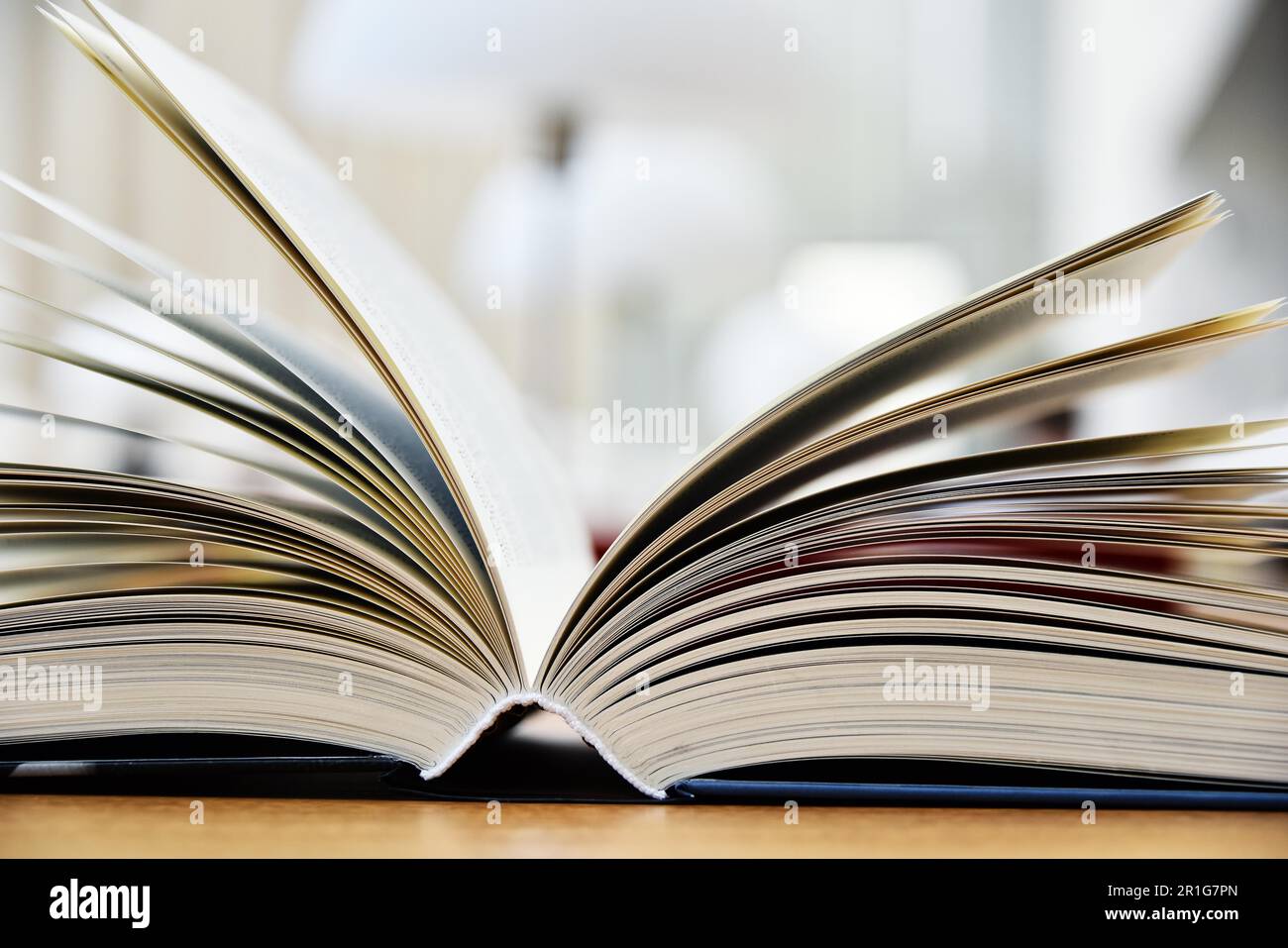 Book lying on the table hi-res stock photography and images - Alamy