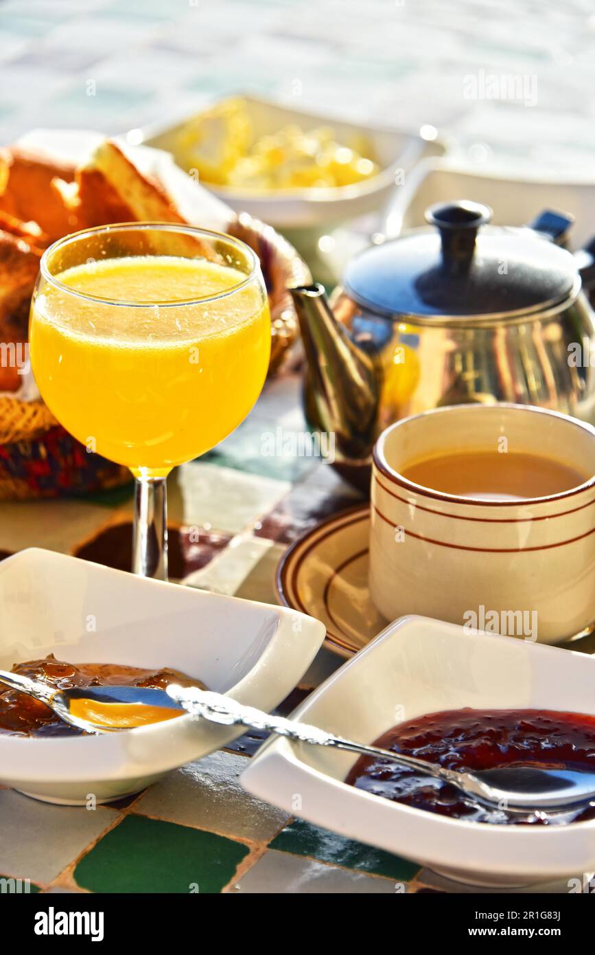 Moroccan breakfast served on hotel terrace in Atlas Mountains Stock ...