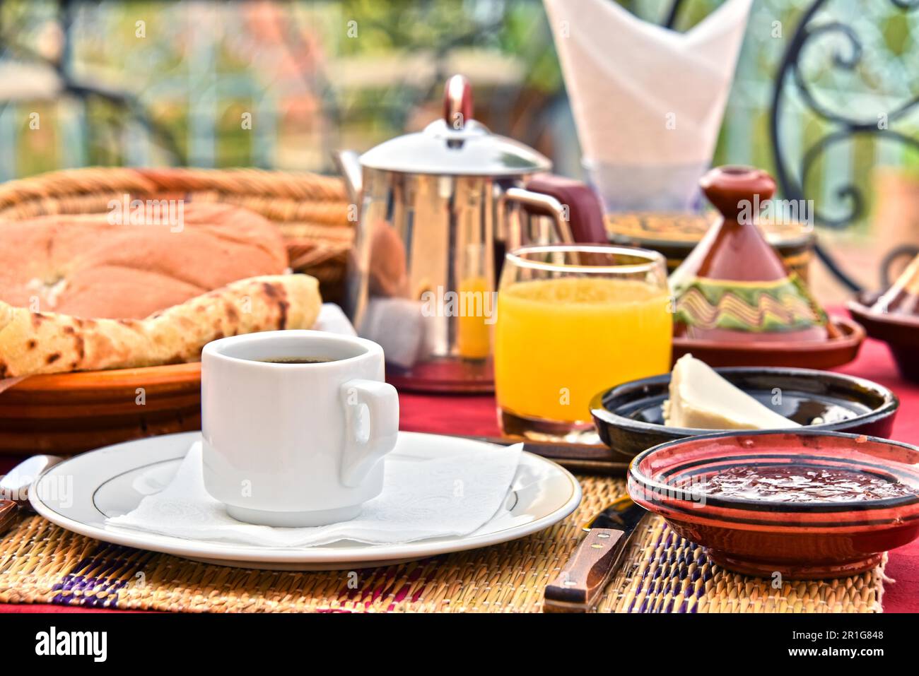 Moroccan breakfast served on hotel terrace in Atlas Mountains Stock ...