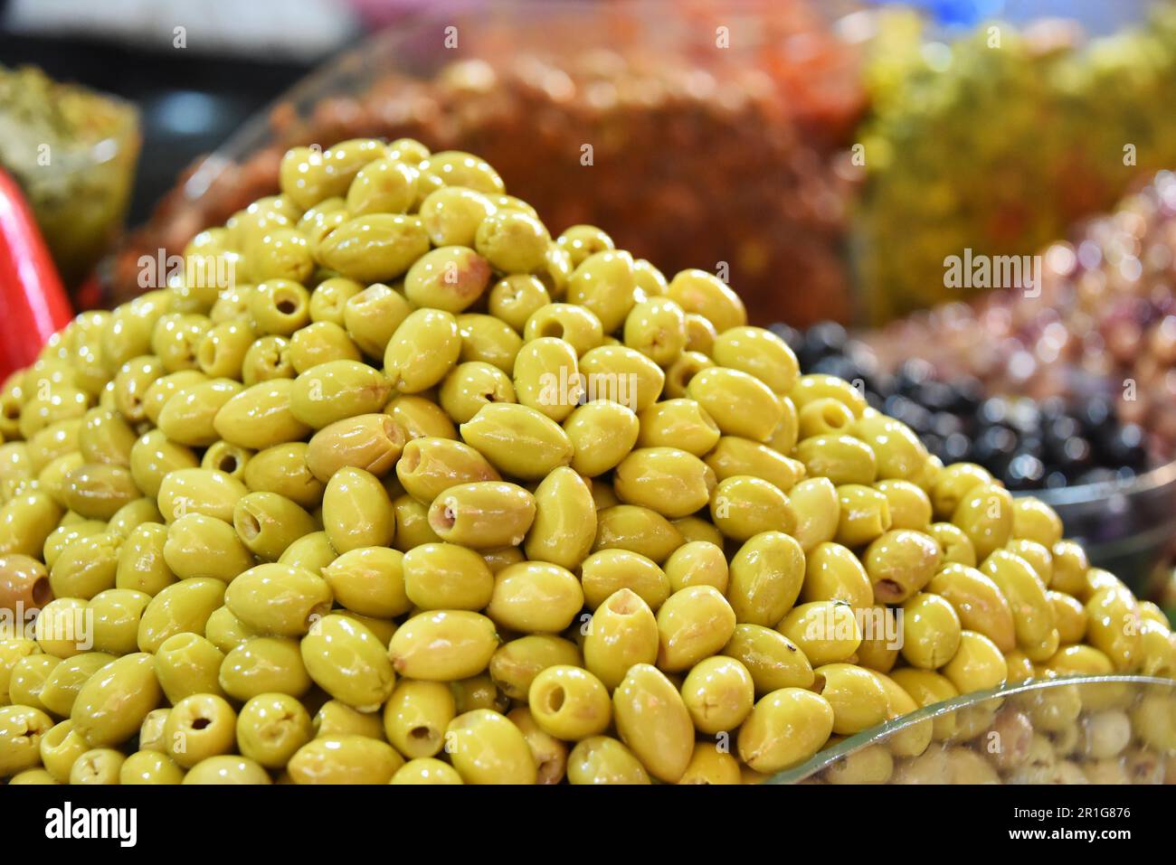 Assorted olives on the arab street market stall Stock Photo - Alamy