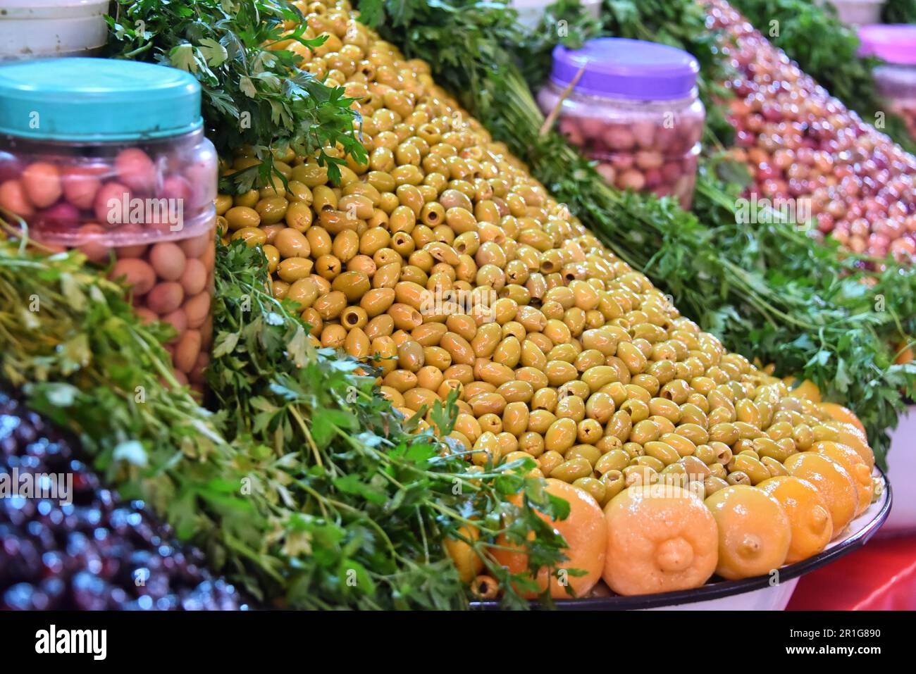 Assorted olives on the arab street market stall Stock Photo - Alamy