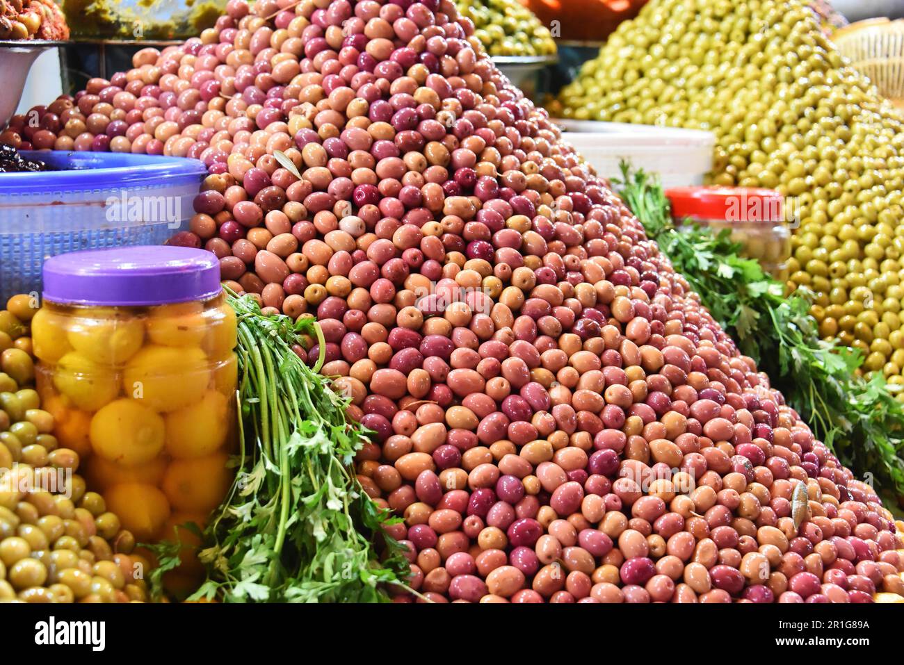 Assorted olives on the arab street market stall Stock Photo - Alamy