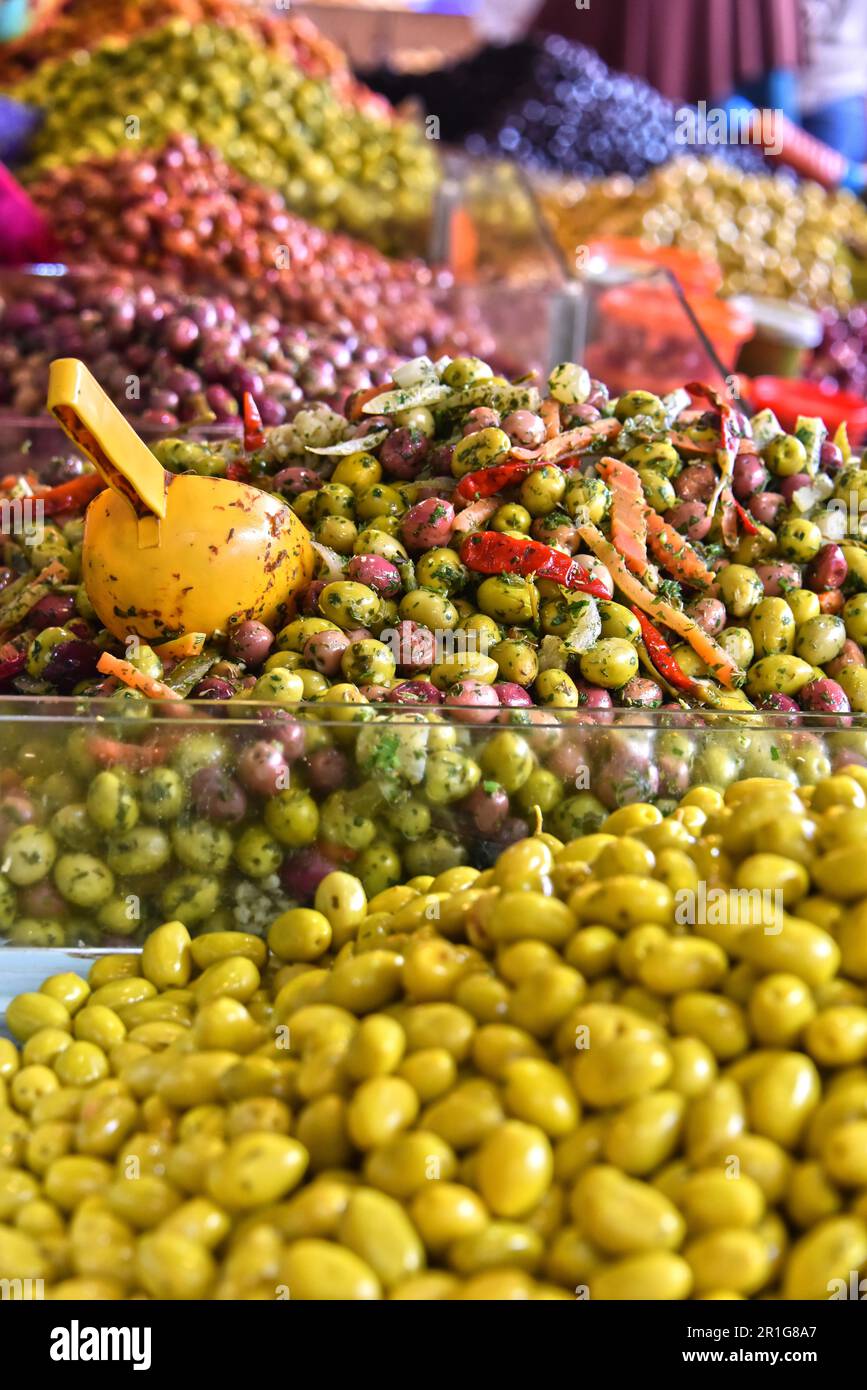 Assorted olives on the arab street market stall Stock Photo - Alamy
