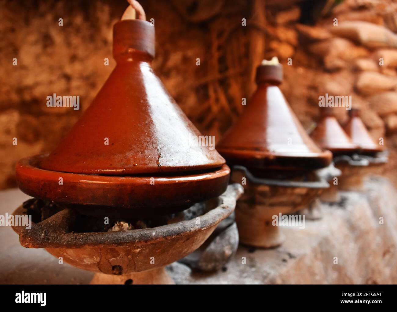 Cooking traditional Moroccan dish, meat and vegetable in tajine Stock ...