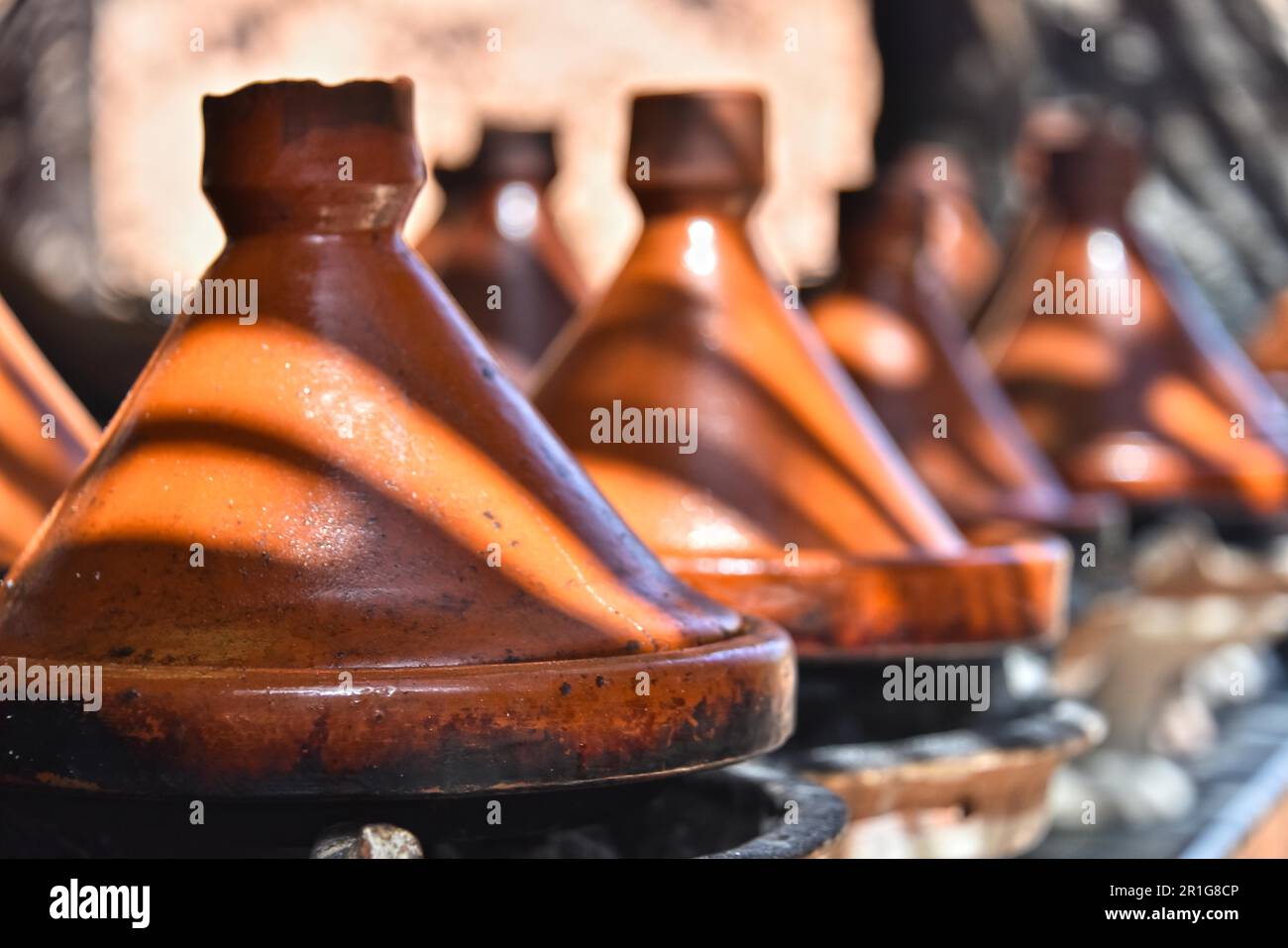 Cooking traditional Moroccan dish, meat and vegetable in tajine Stock ...