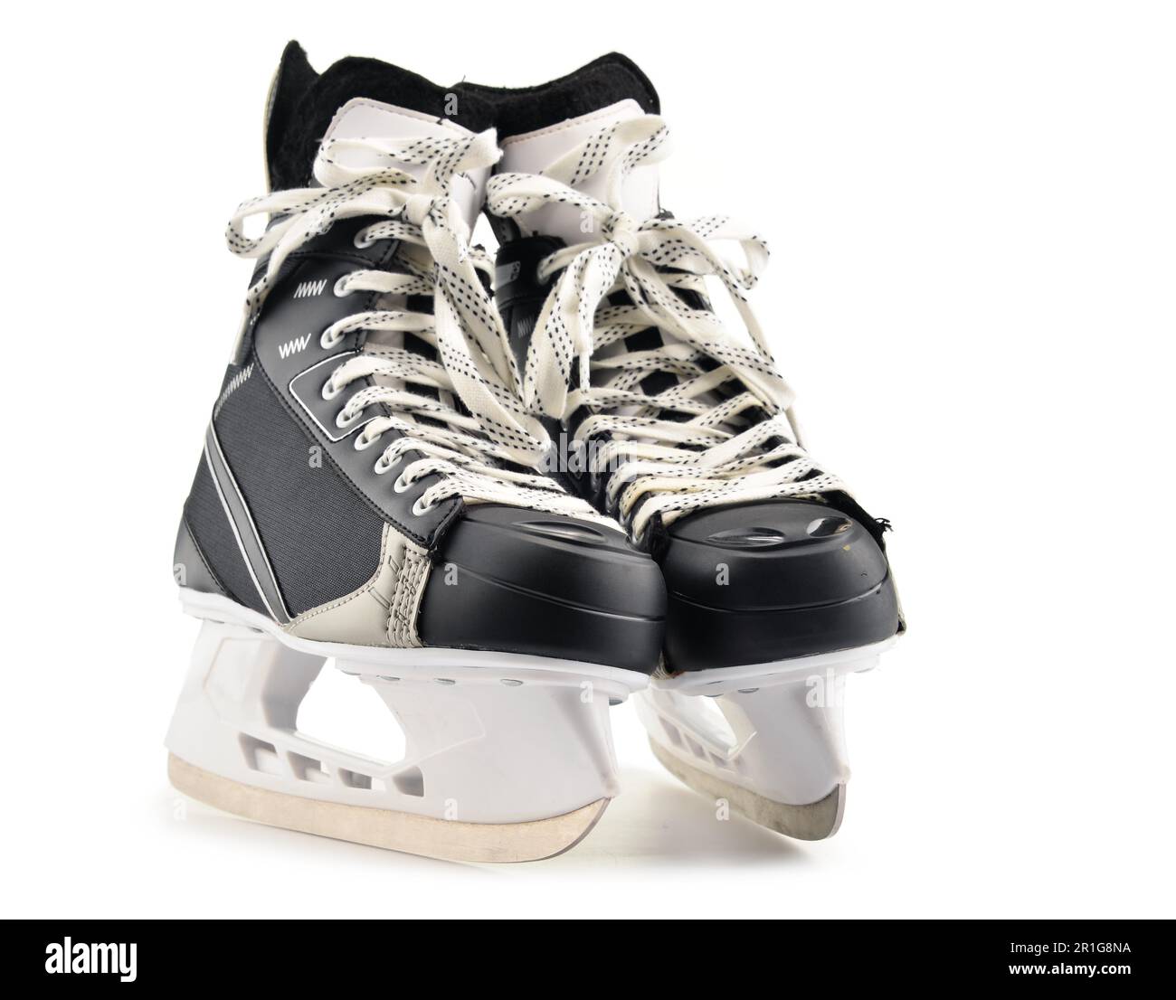 Pair of ice hockey skates isolated on white background Stock Photo - Alamy