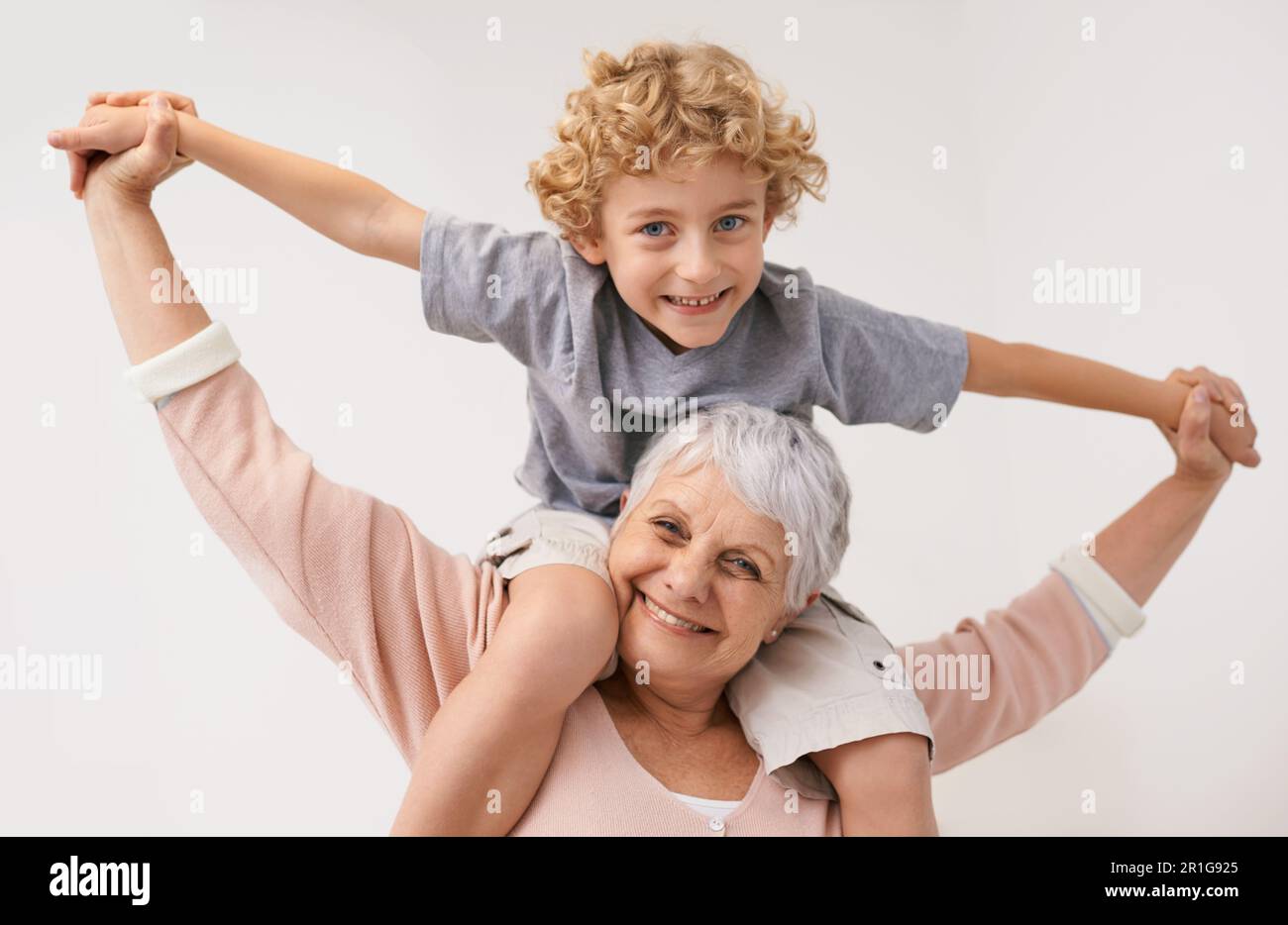 Portrait, airplane and grandmother with child embrace, happy and ...