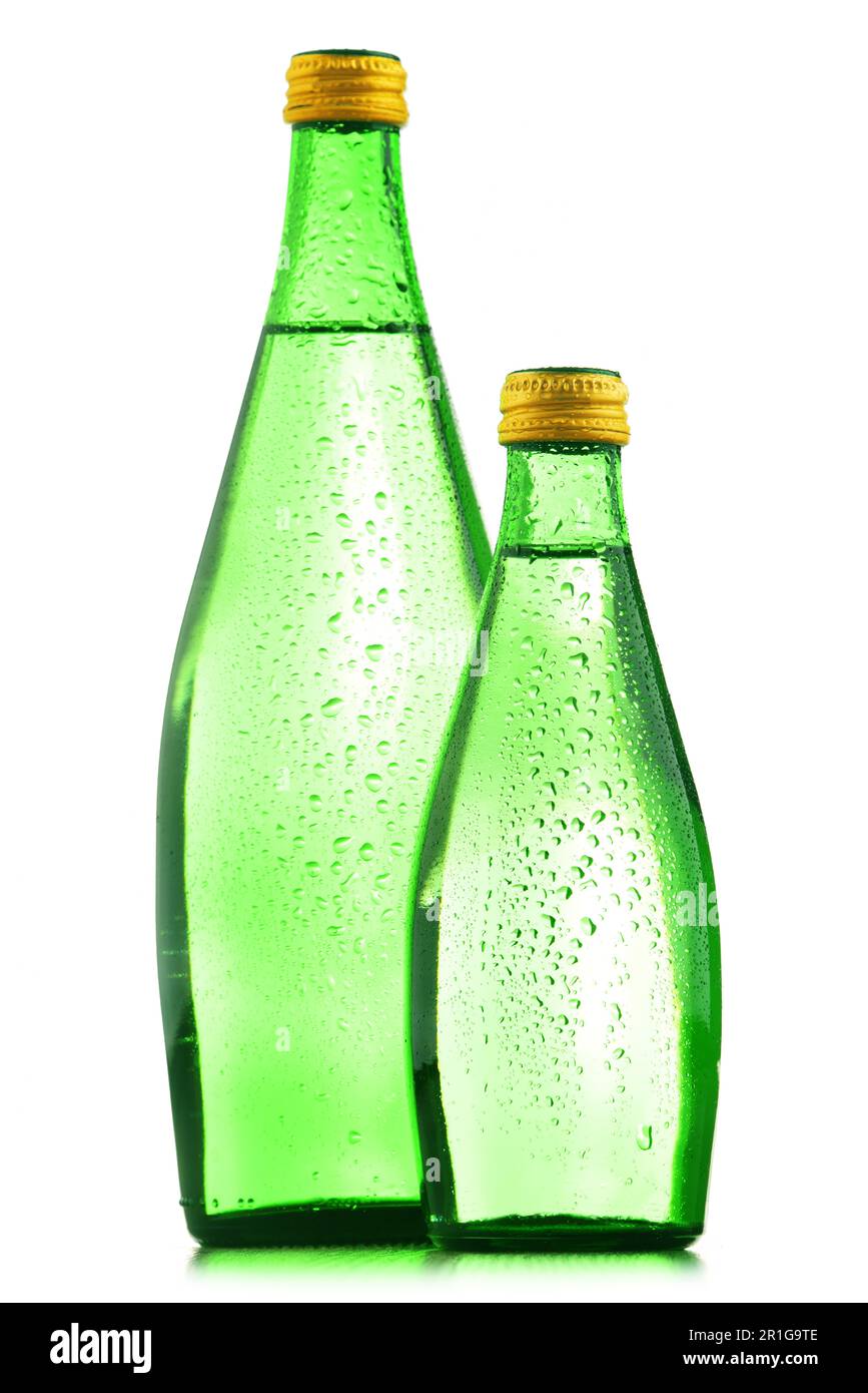 Glass bottles of mineral water isolated on white background Stock Photo - Alamy