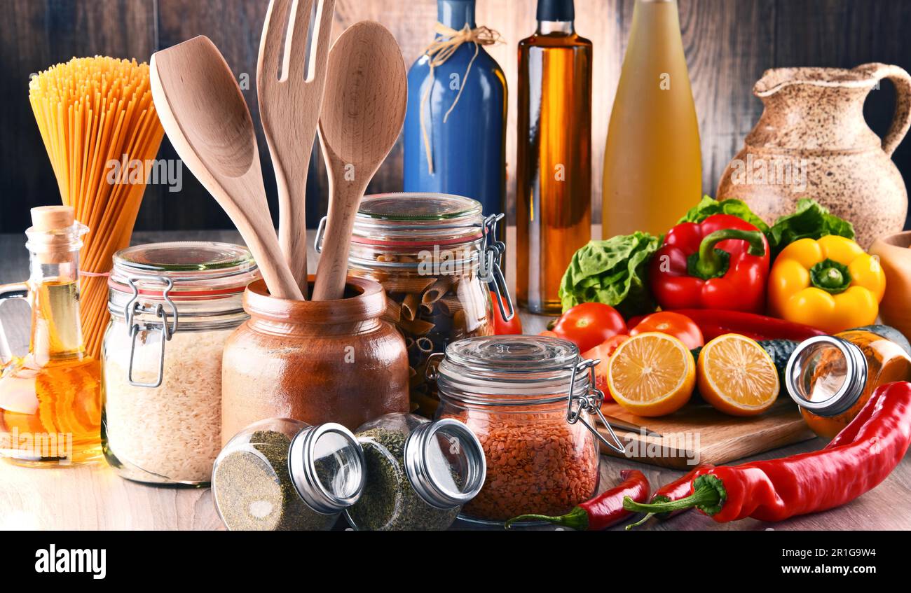 Composition with assorted food products and kitchen utensils on the ...
