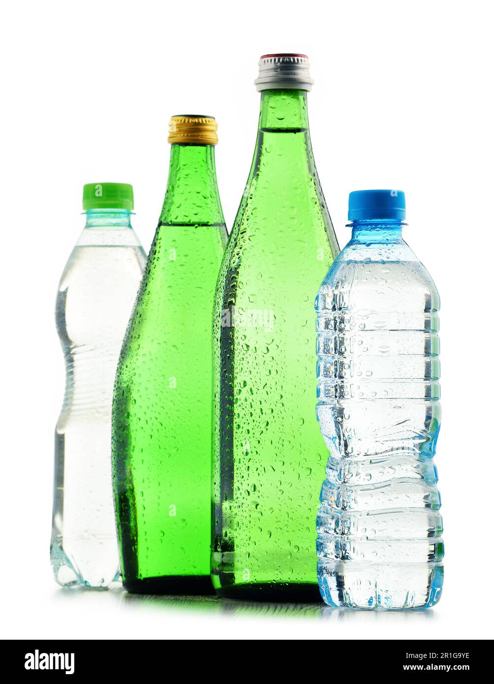 Glass and plastic bottles of mineral water isolated on white background Stock Photo - Alamy