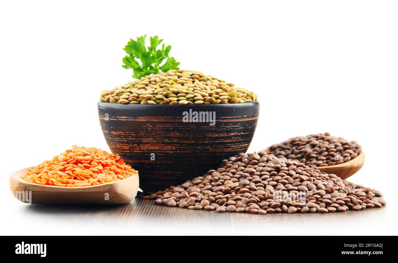 Composition with bowl of lentils isolated on white background Stock Photo - Alamy
