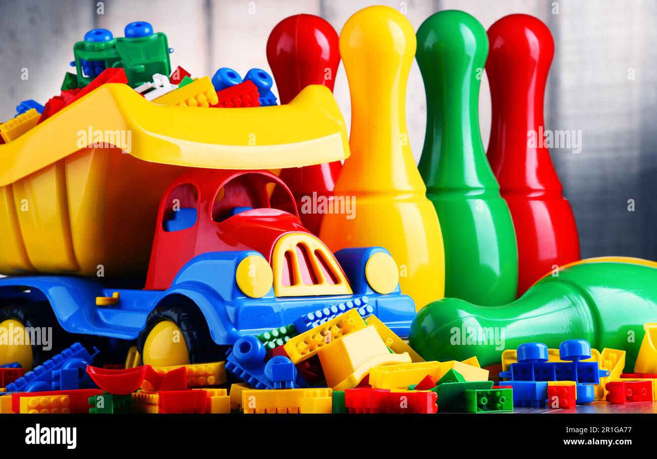 Colorful plastic toys in children's room Stock Photo - Alamy
