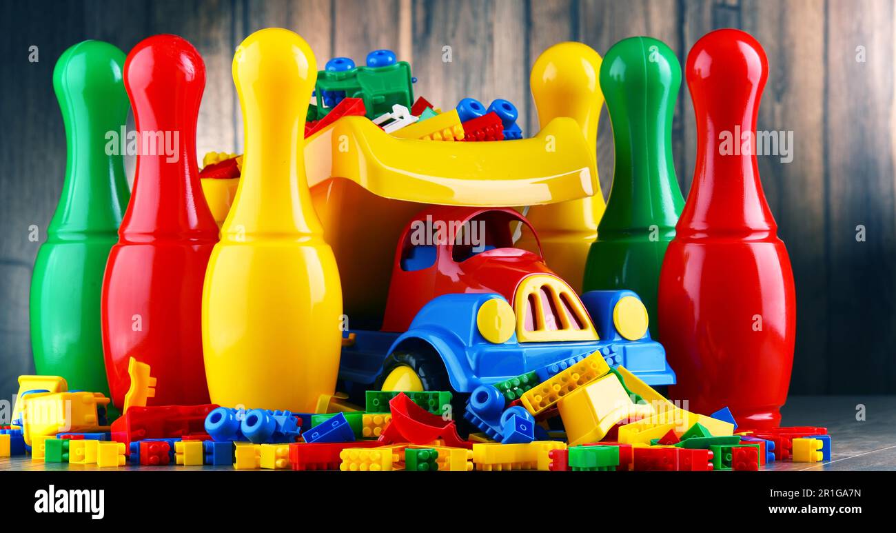Colorful plastic toys in children's room Stock Photo - Alamy