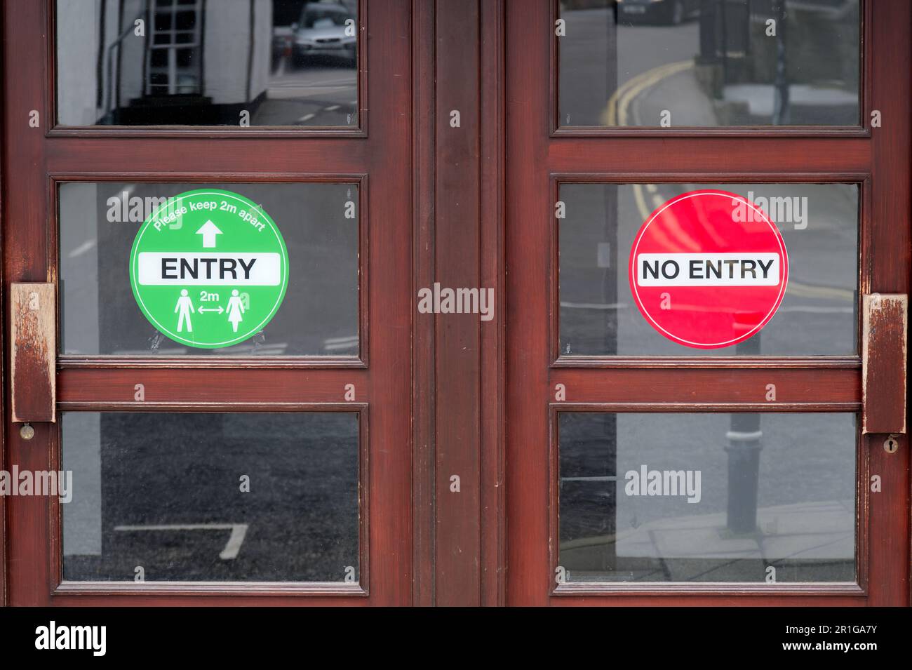 Entry and No Entry sight on shop door for customer segregation Stock ...