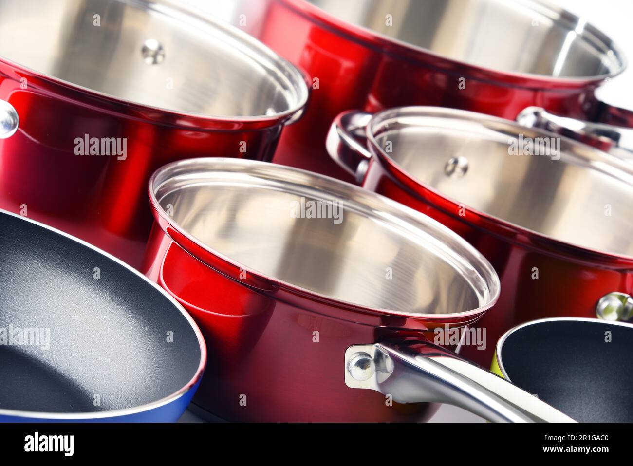 Composition with a set of steel pots Stock Photo - Alamy