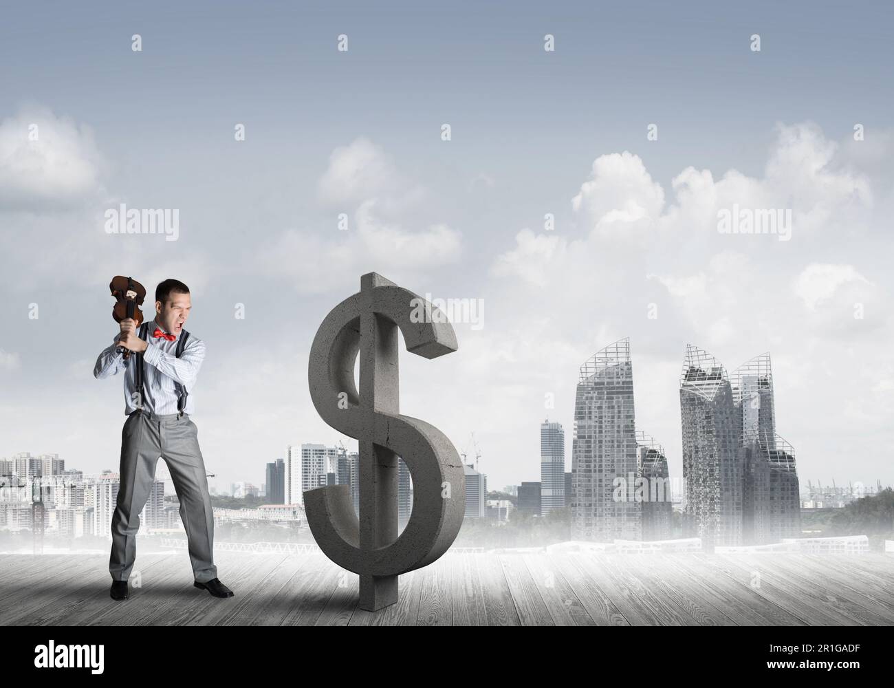Determined banker man against modern cityscape breaking dollar concrete ...
