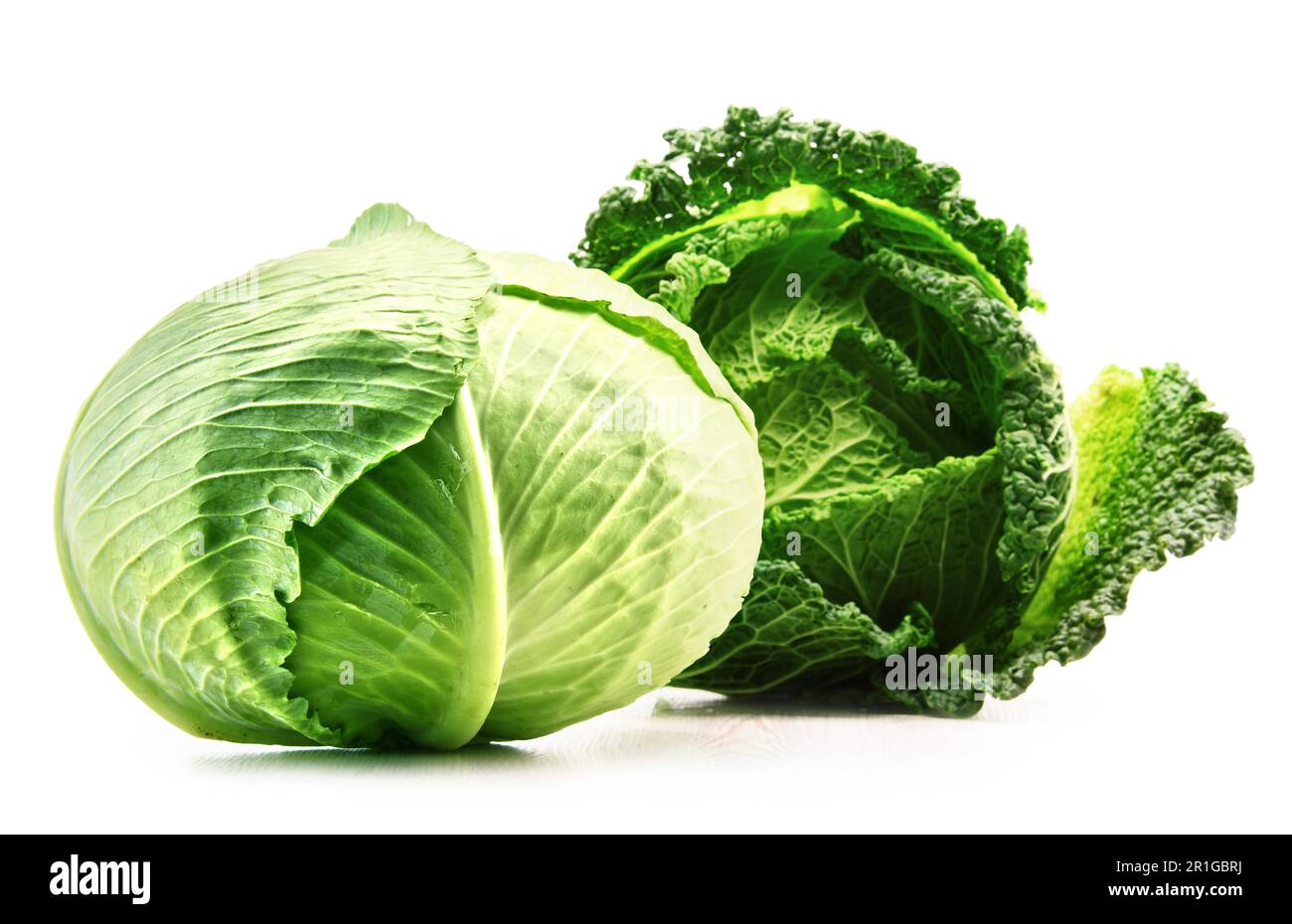 Two fresh organic cabbage heads isolated on white background Stock ...