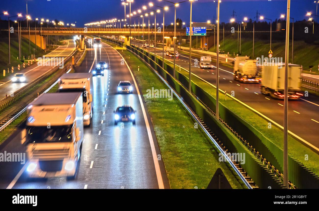 Trucks on four lane controlled-access highway in Poland Stock Photo - Alamy