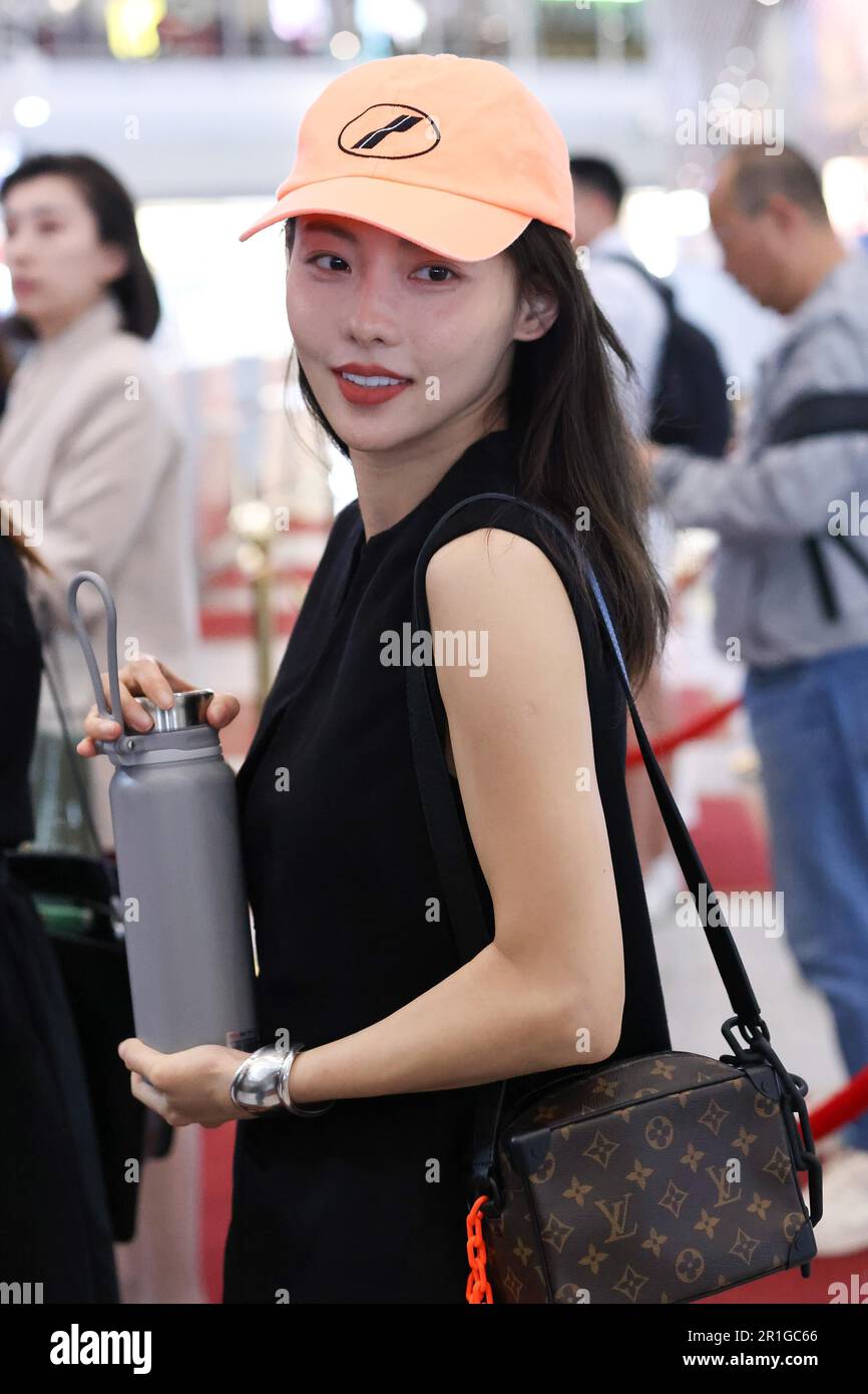Chinese actress and singer Jenny Zhang appeared at airport in Beijing ...